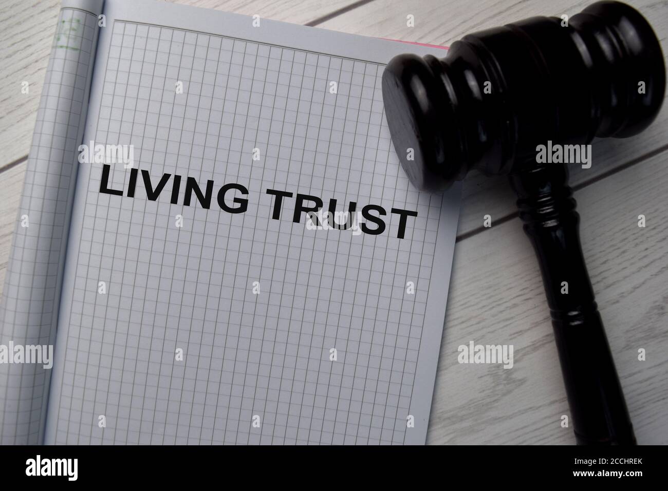 Living Trust write on a book and gavel isolated on office desk Stock ...