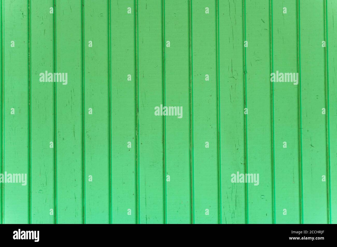 the surface of the wooden slats is painted green Stock Photo - Alamy