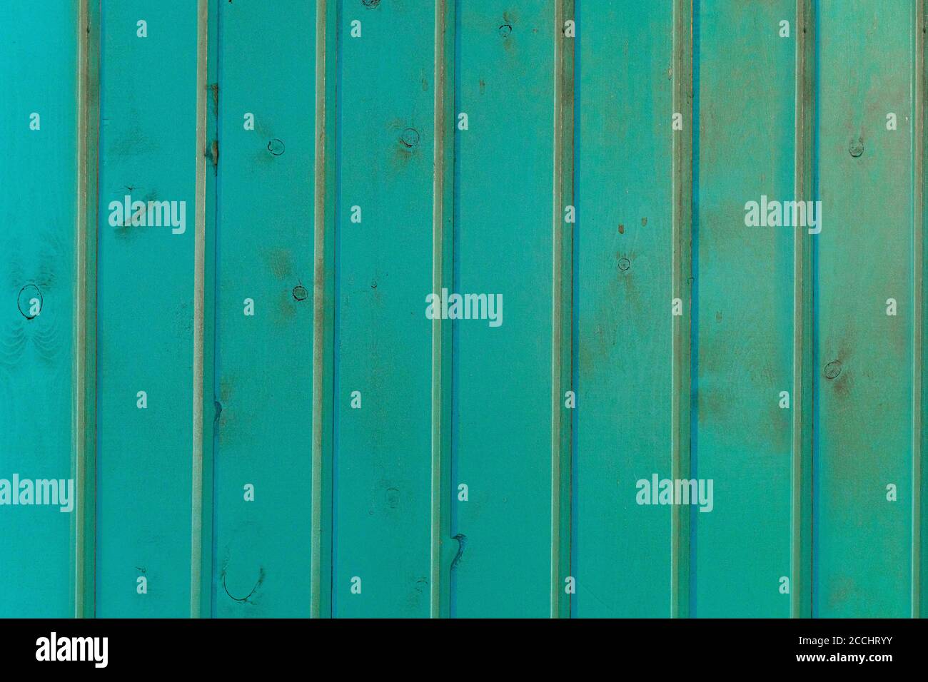 the surface of the wooden slats is painted green Stock Photo - Alamy