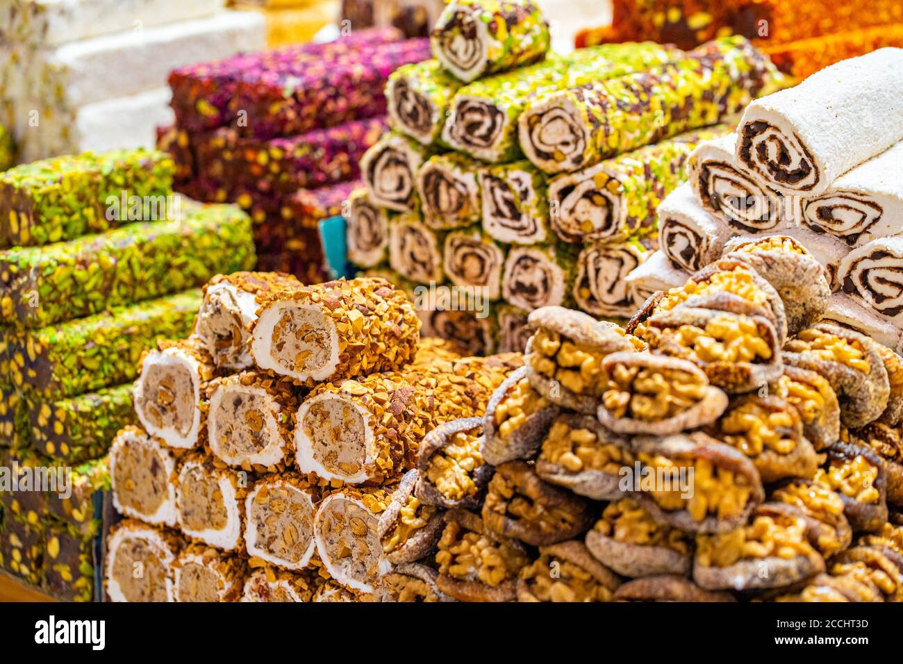 Various bright colored turkish delights sweets baklava lokum and dried ...