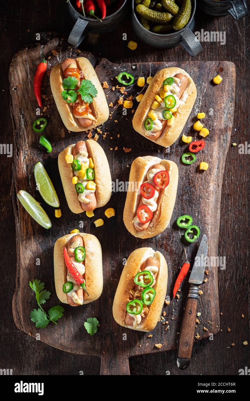 Fresh mini hot dogs with pork sausage and sauce Stock Photo - Alamy