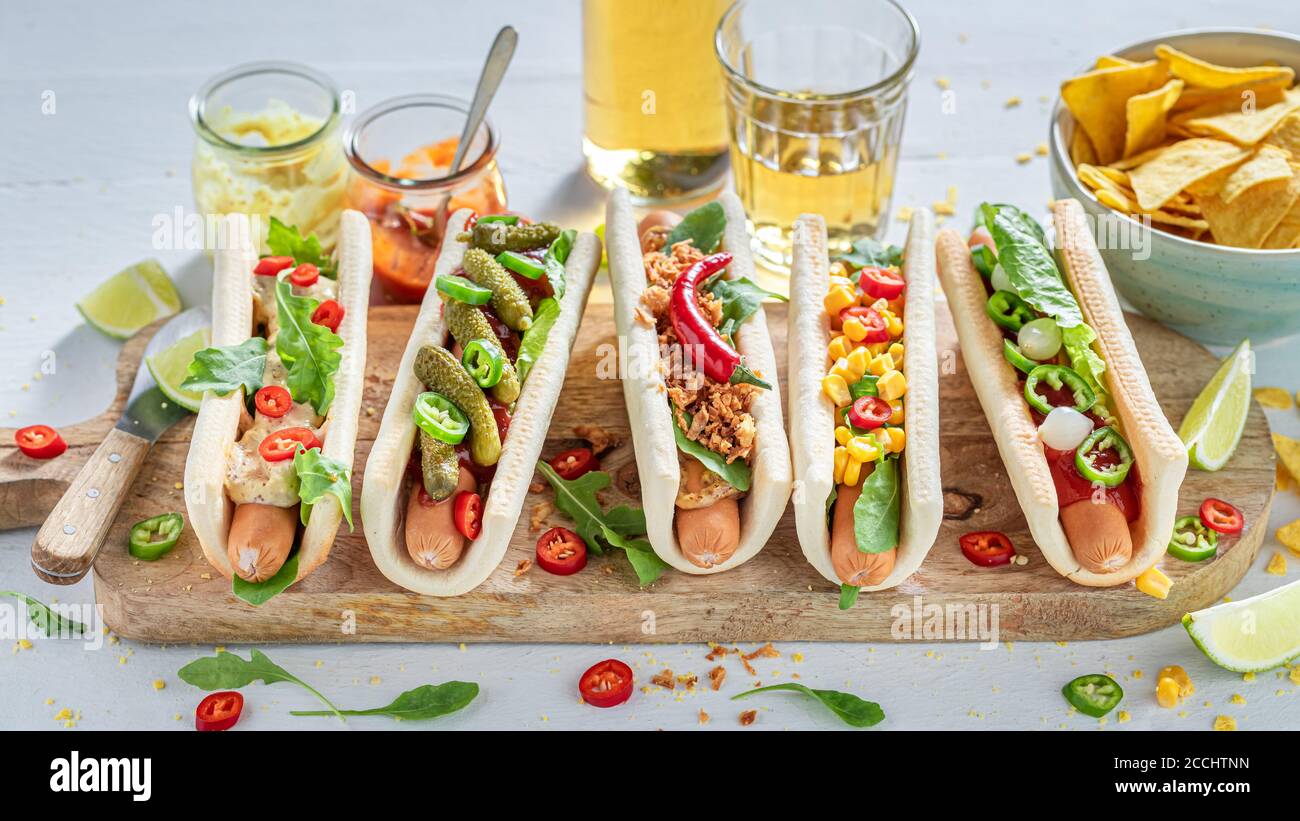 Unhealthy hot dogs with mustard and ketchup Stock Photo - Alamy