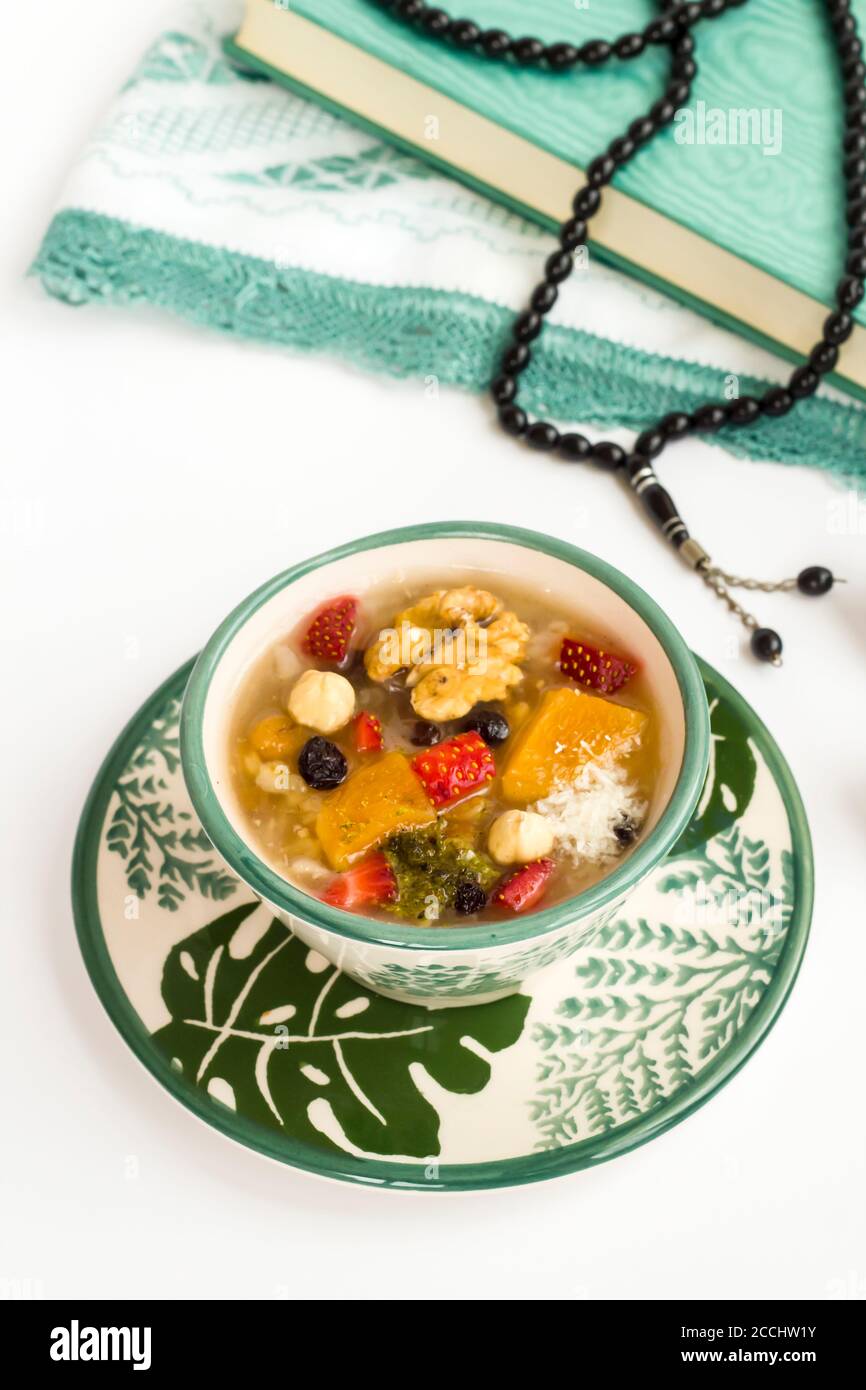 Religious ritual "Ashura fast" in Islam composition with Ashura Dish ...