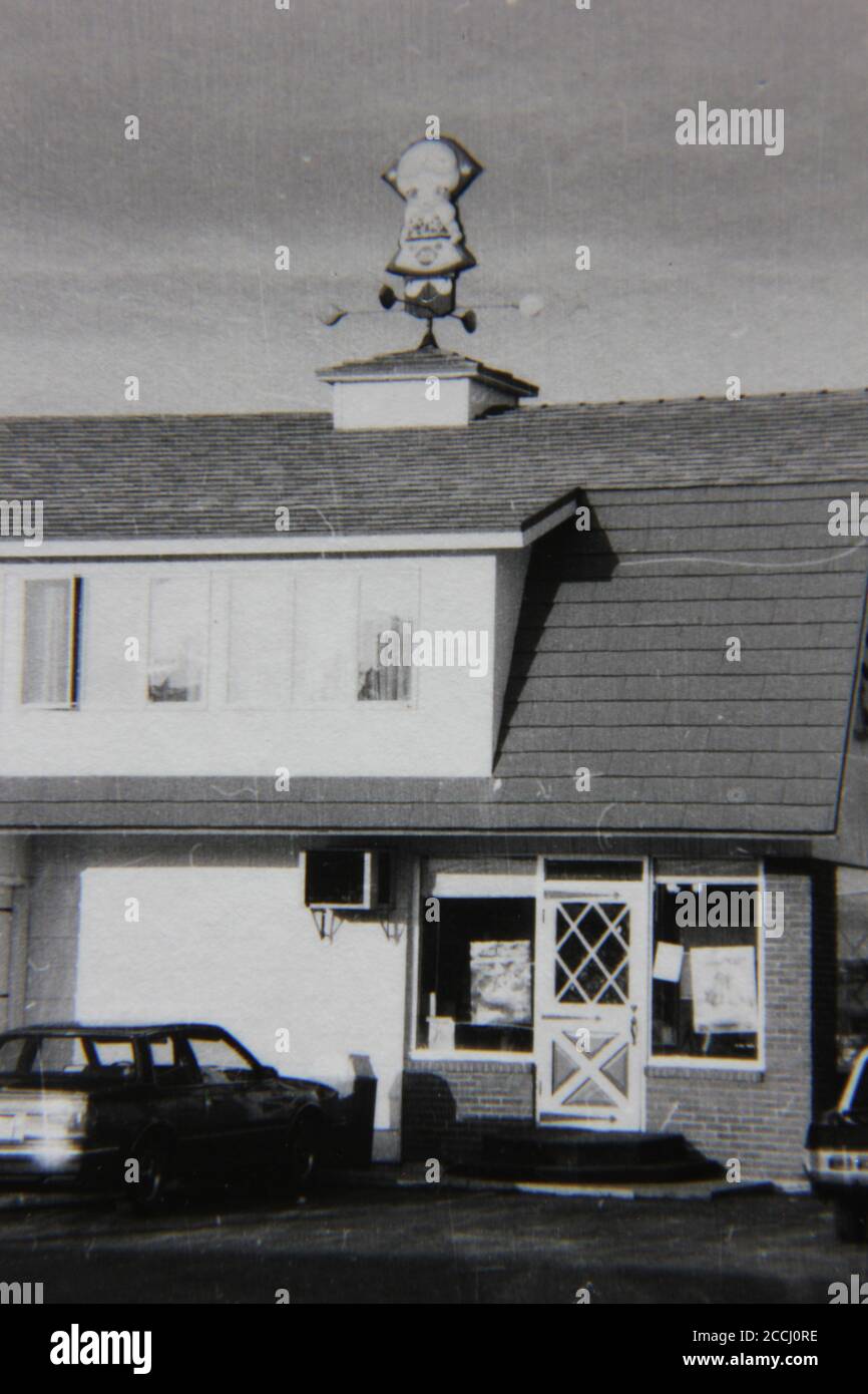 Fine 1970s vintage black and white photography of a regular garage ...