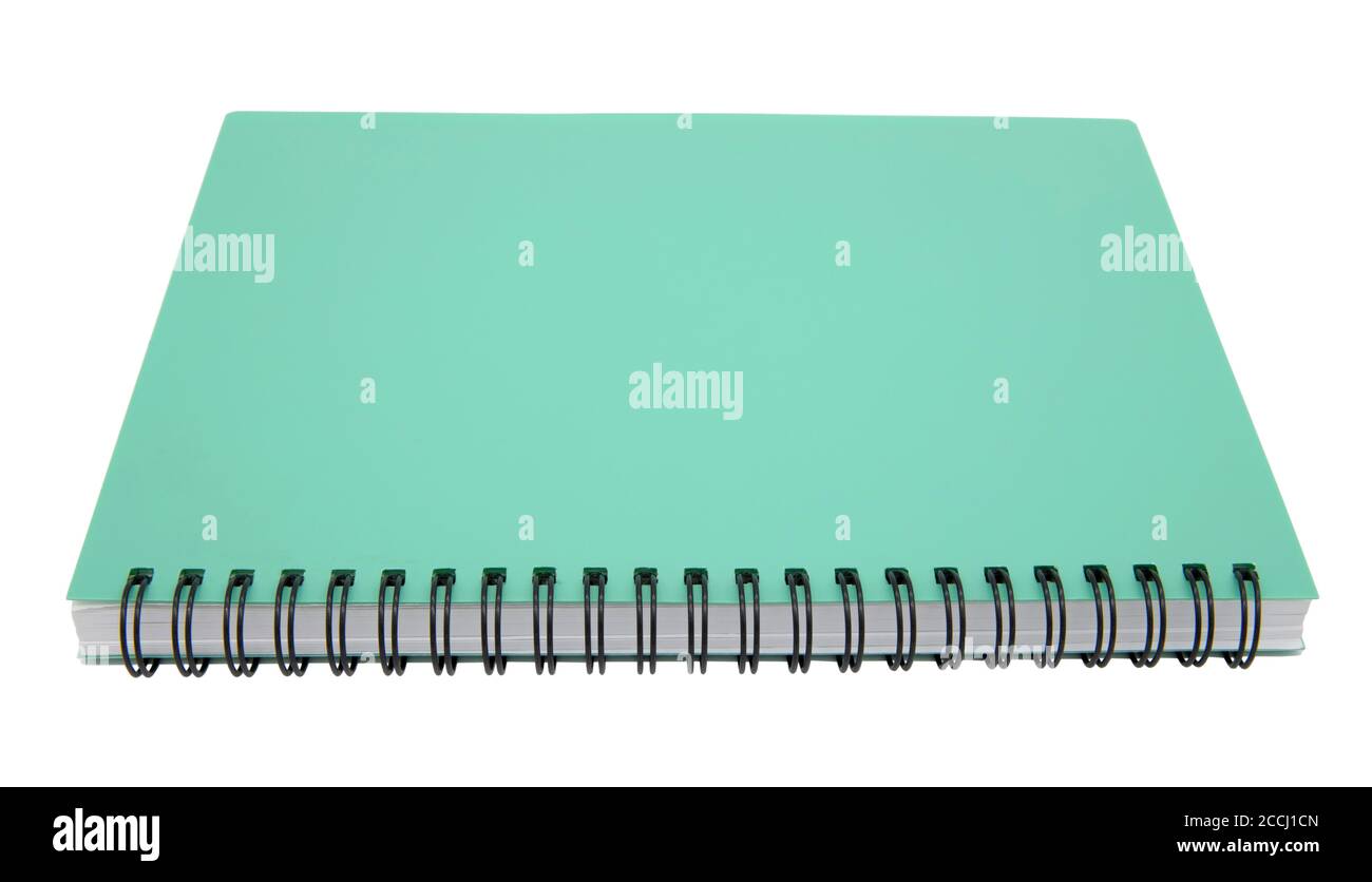 Green spiral notebook isolated on white background Stock Photo - Alamy