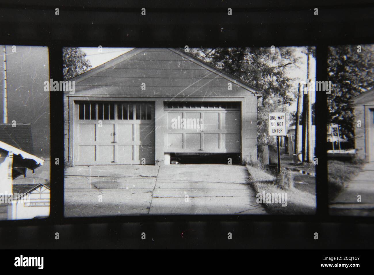 Fine 1970s vintage black and white photography of a regular garage ...