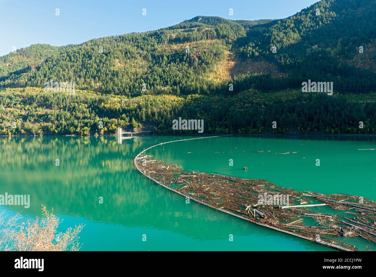 A log boom stretches across the Carpenter Lake Reservoir at the ...