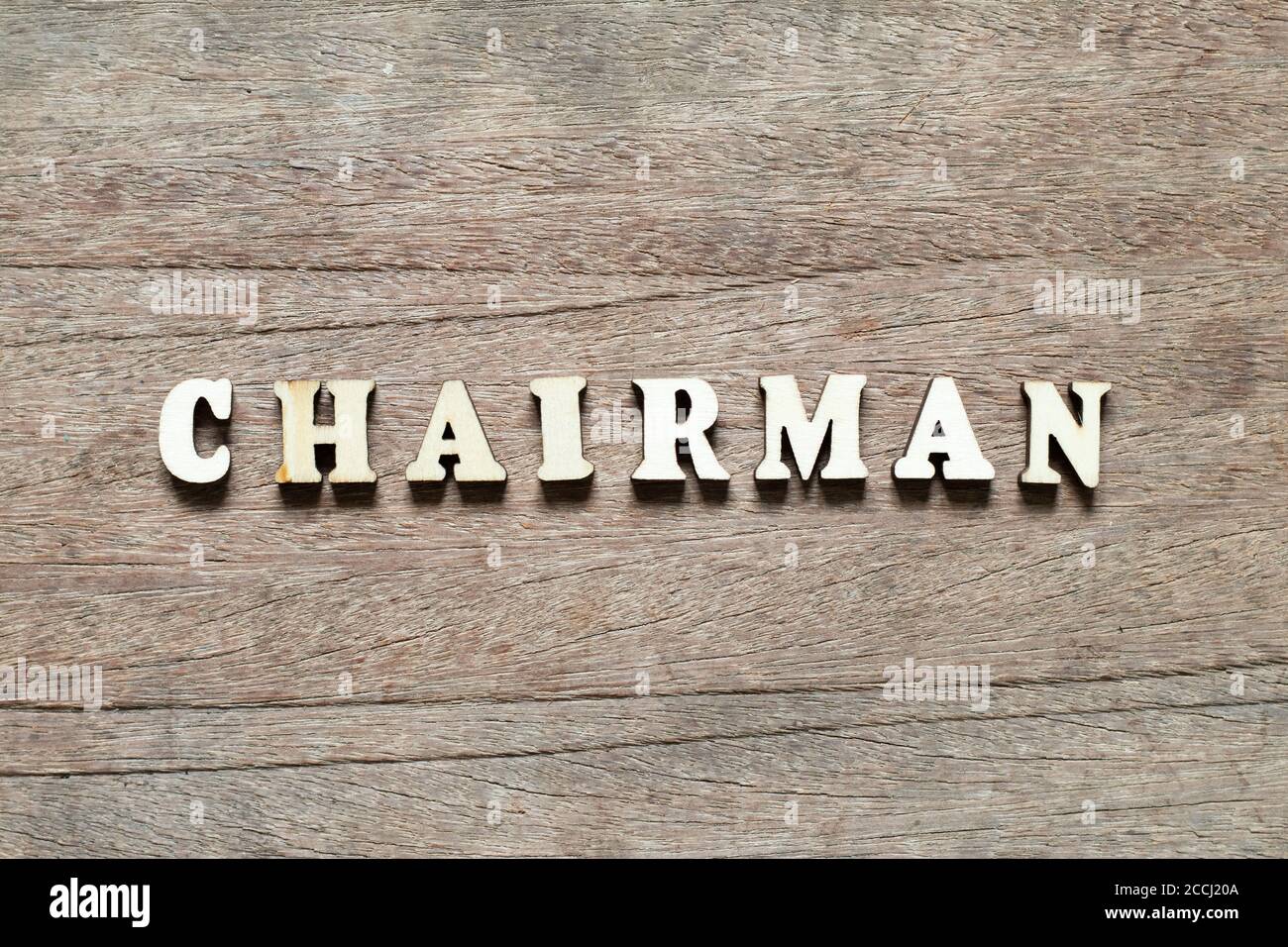 Alphabet letter block in word chairman on wood background Stock Photo ...