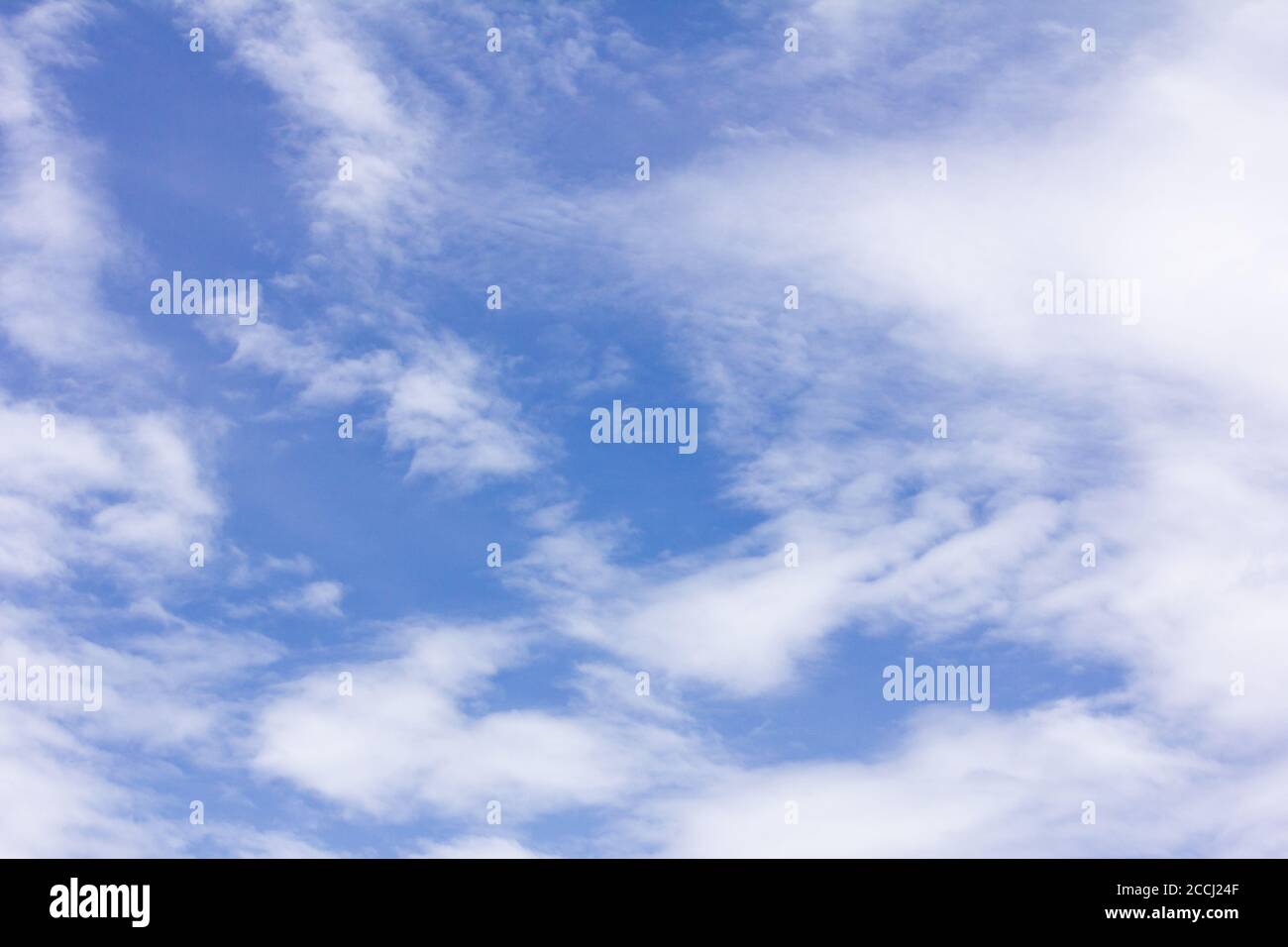 Clear blue color sky with white cloud background Stock Photo - Alamy