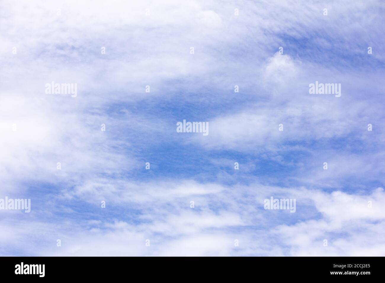 Clear blue color sky with white cloud background Stock Photo - Alamy