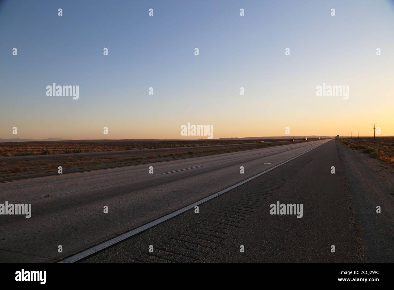 A dust storm covers the setting sun along the california border Stock ...