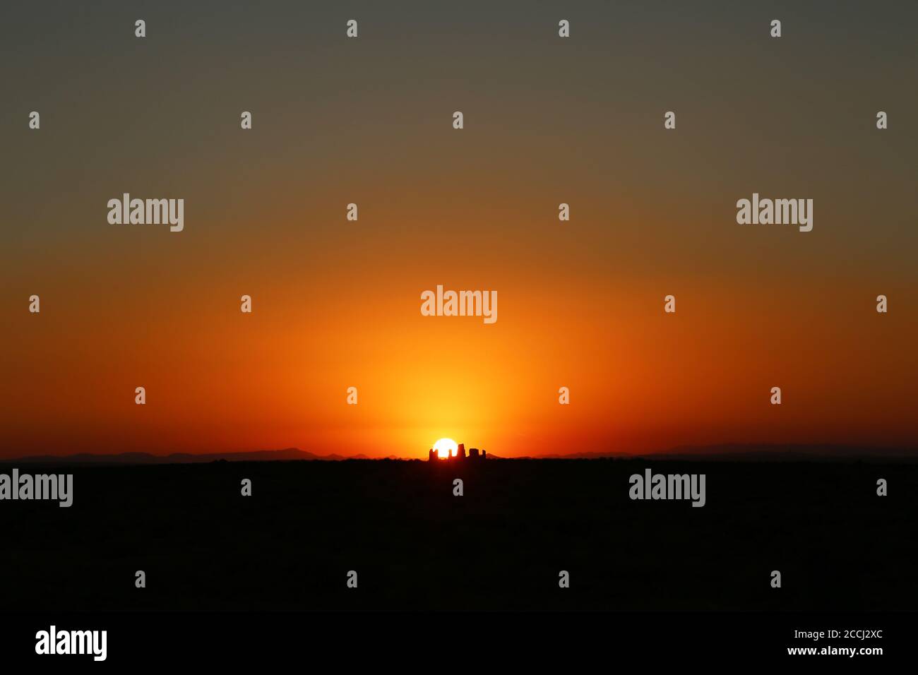 A dust storm covers the setting sun along the california border Stock ...