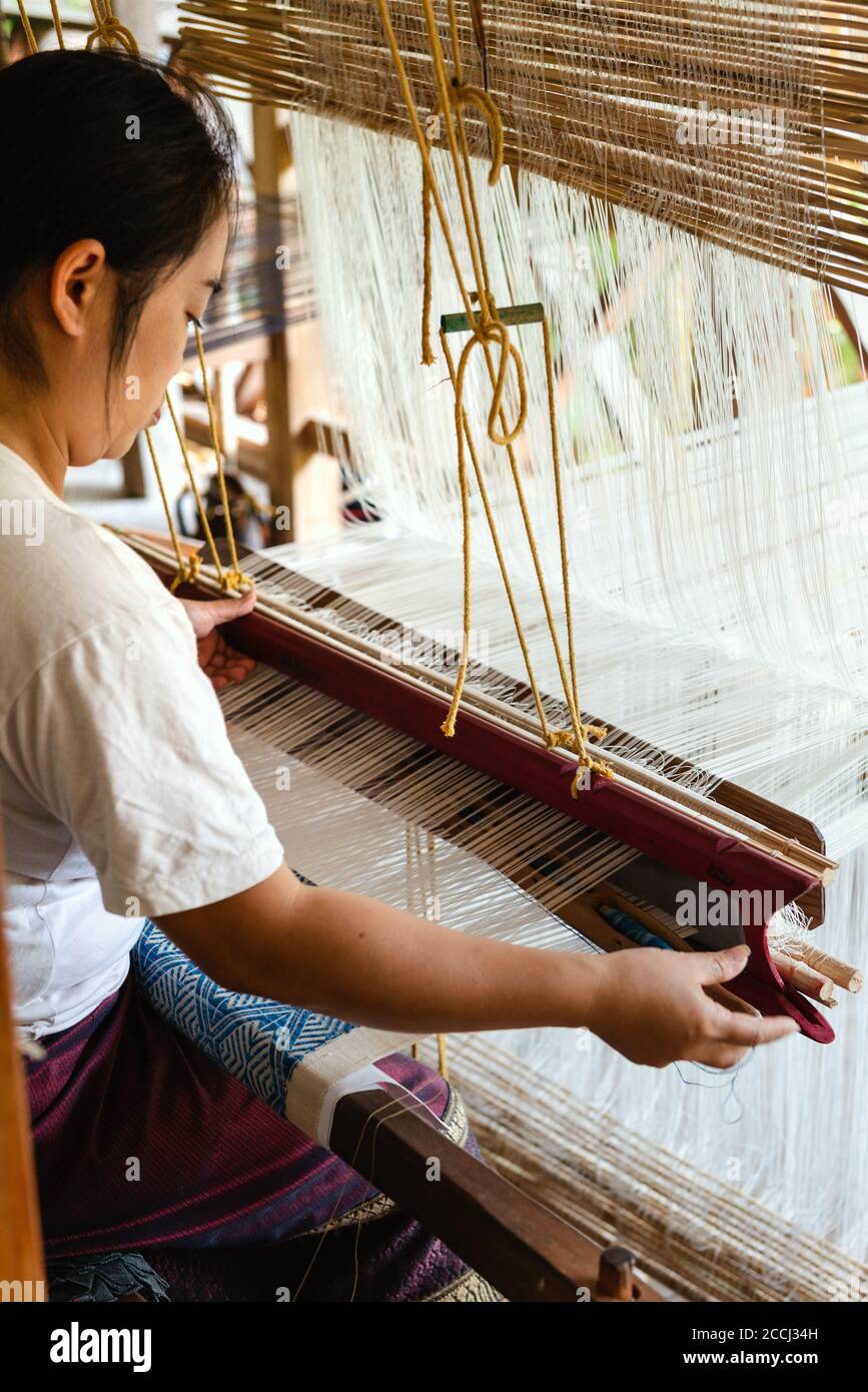 Woman at lao loom hi-res stock photography and images - Alamy