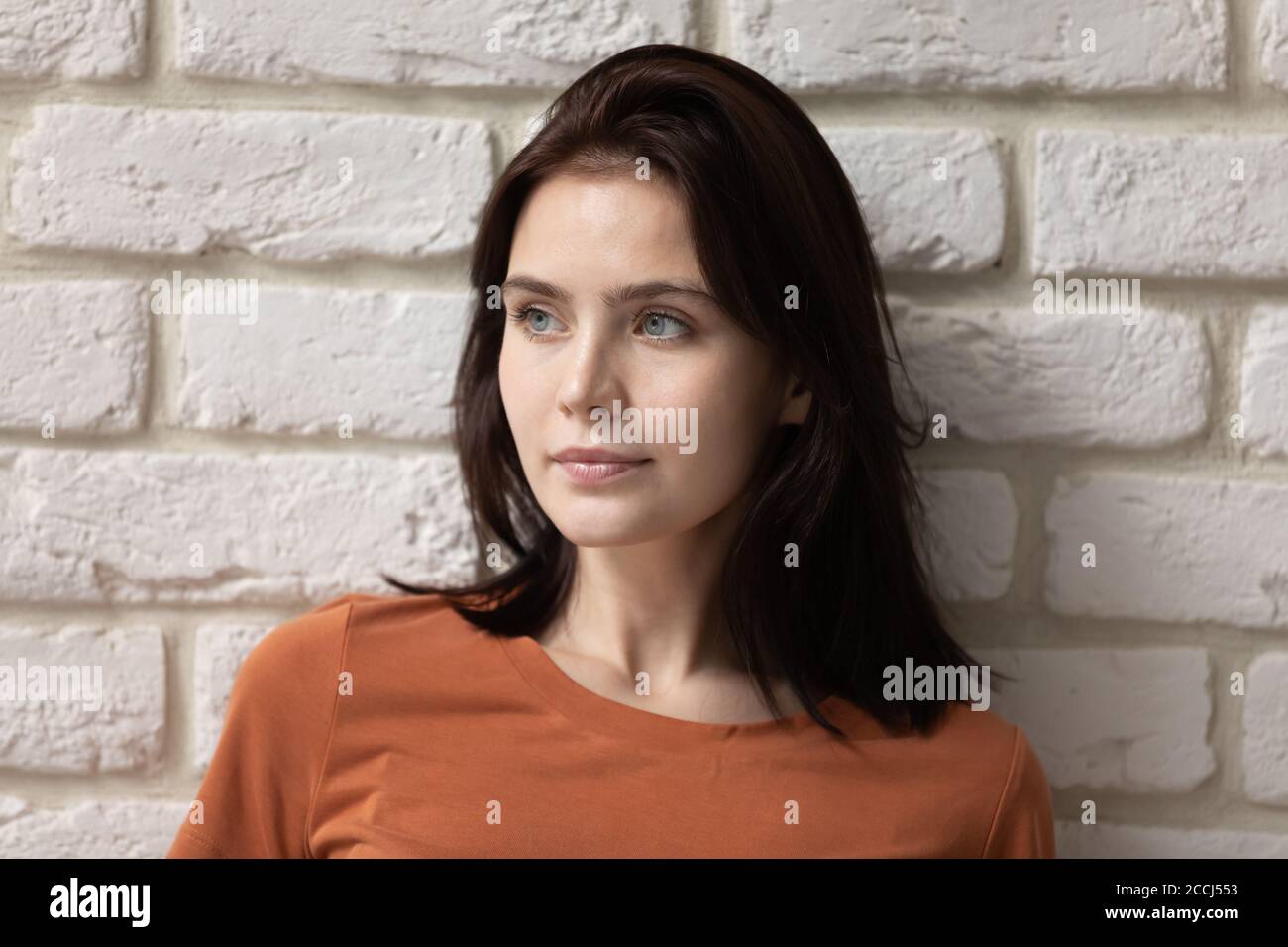 Pensive girl look in distance thinking or dreaming Stock Photo - Alamy