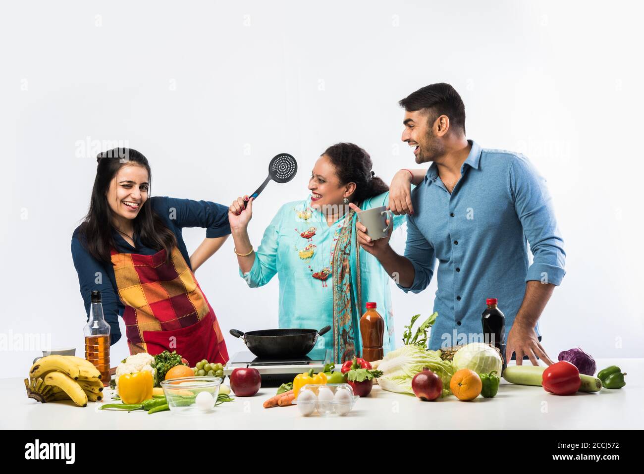Indian mom and daughter cooking hi-res stock photography and images - Alamy
