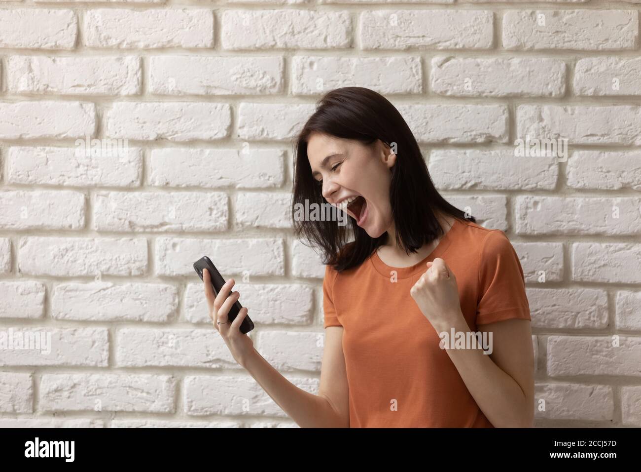 Happy overjoyed teenager girl hi-res stock photography and images - Alamy
