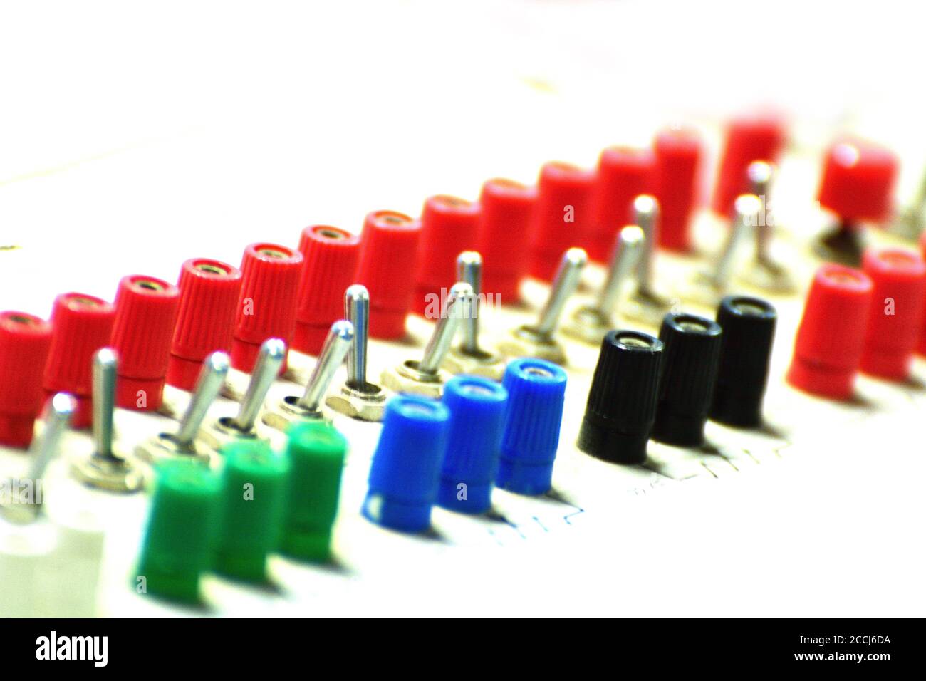 Group of electric switch against white background Stock Photo - Alamy