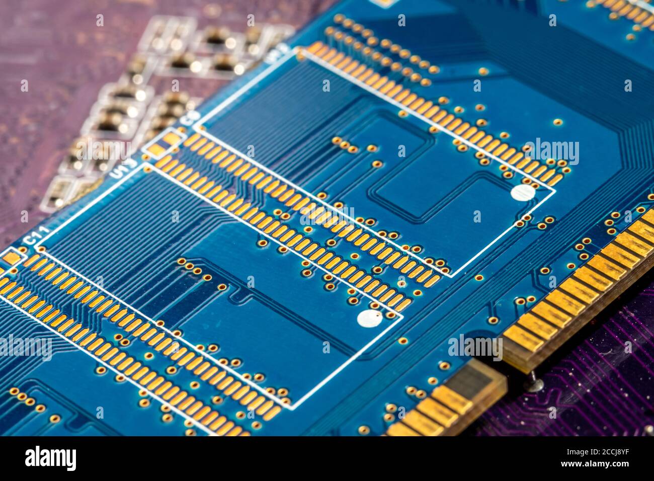 Electronic Board RAM with the lines and chips, semiconductor elements close up. The concept of ...