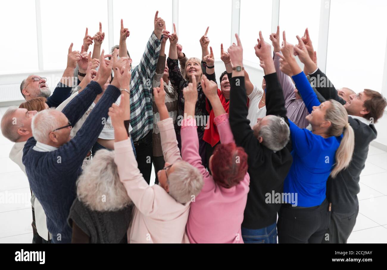 group of advanced people show thumb up Stock Photo - Alamy