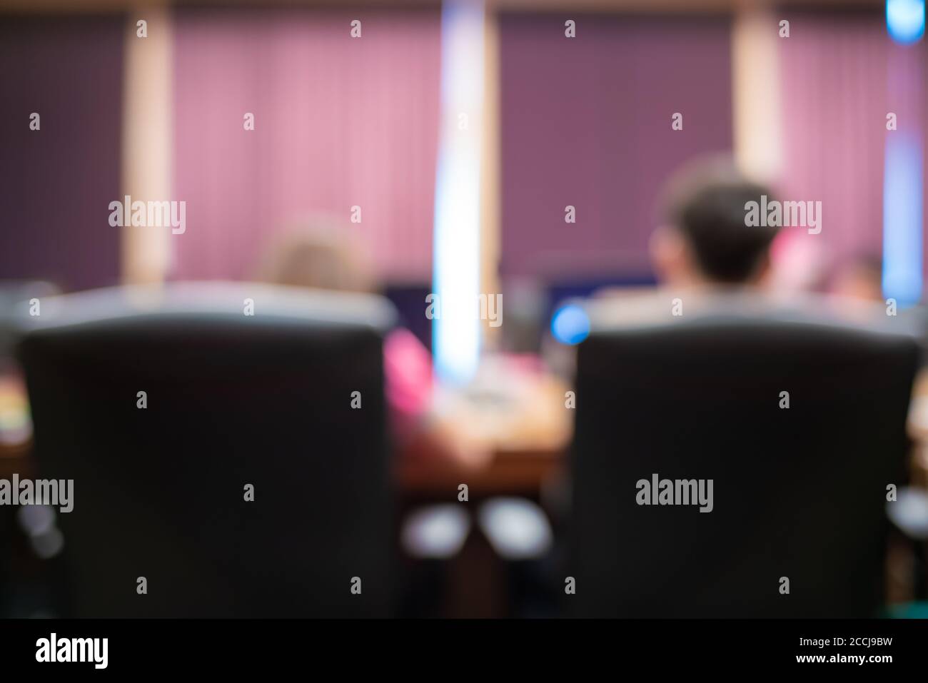 Blurred people sitting in seminar hall room business education Stock ...