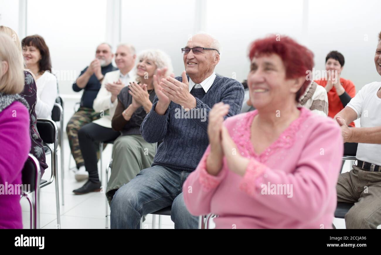Group senior citizens together community hi-res stock photography and ...