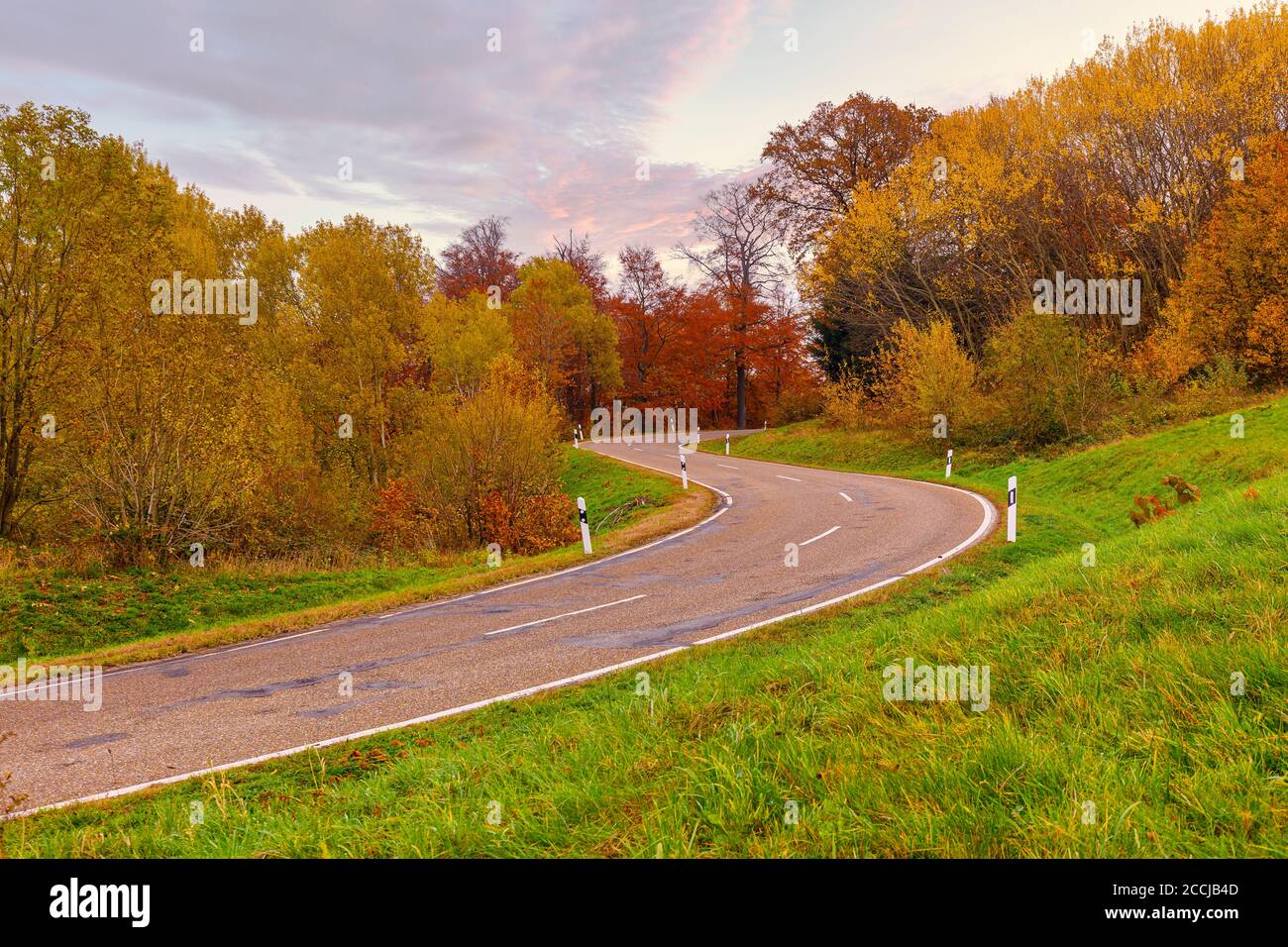 Long winding road sun hi-res stock photography and images - Alamy