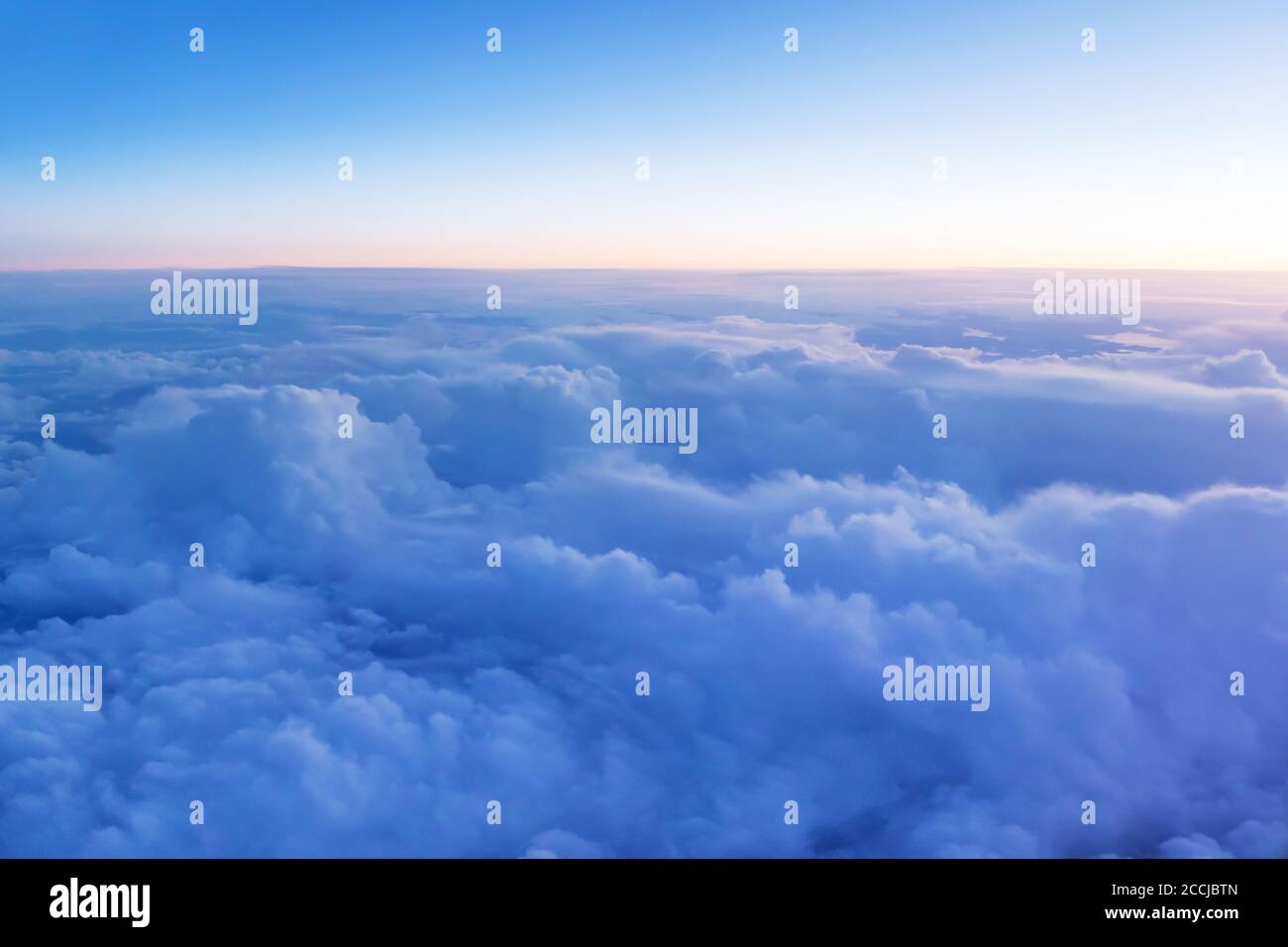 Beautiful sunset panoramic view above clouds. Airplane view Stock Photo ...