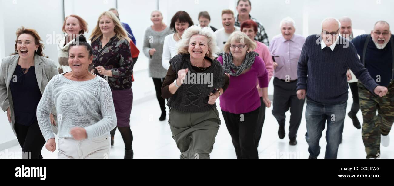 a group of retirees are running for retirement. group of older p Stock ...