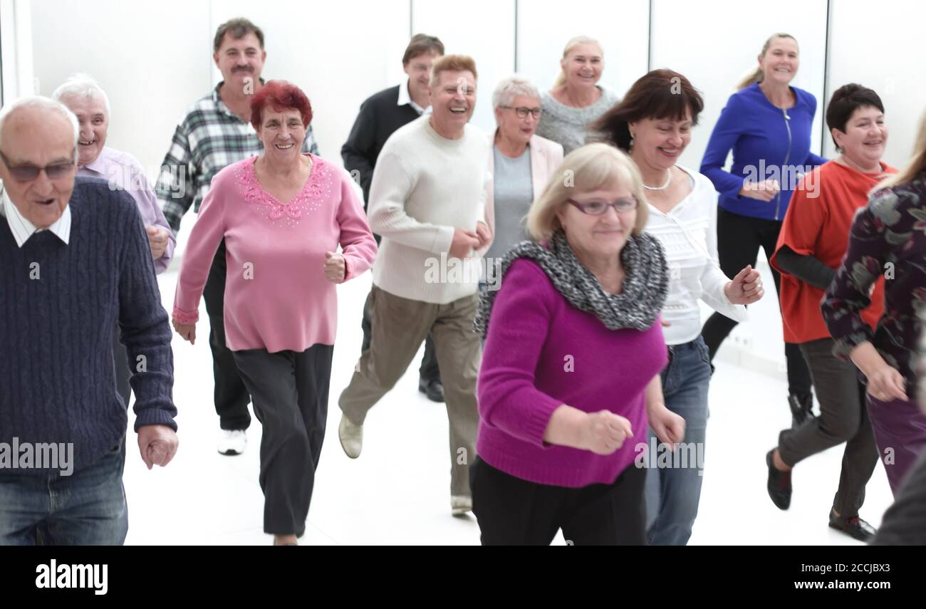 a group of retirees are running for retirement. group of older p Stock ...