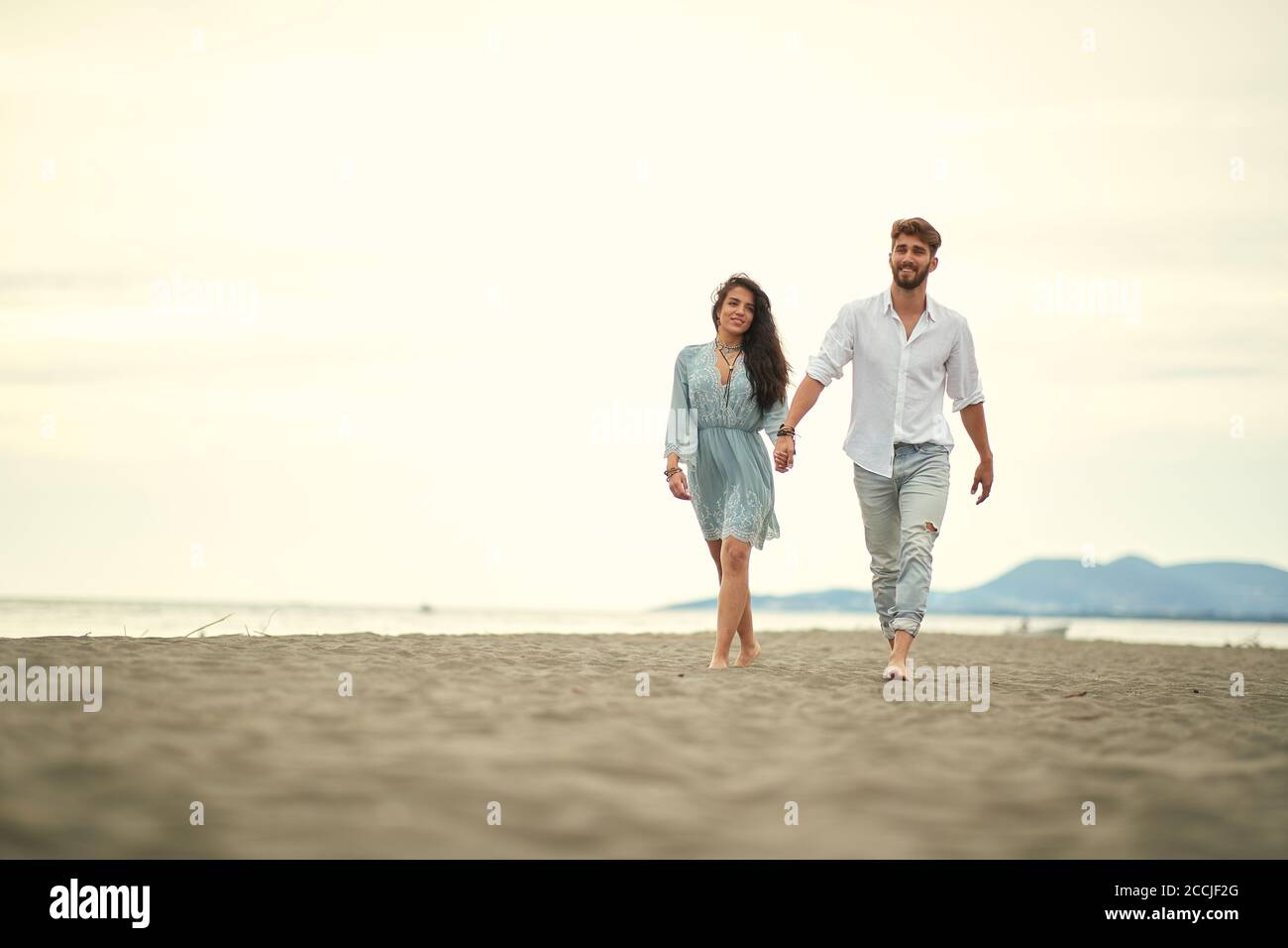Romantic couple strolling hi-res stock photography and images - Alamy