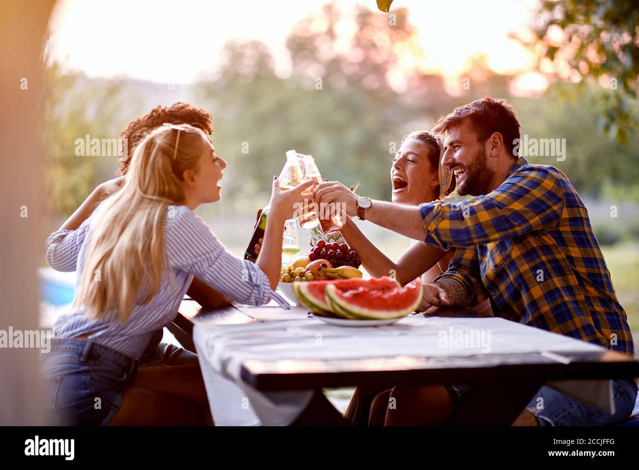 Young people having fun outdoor, talking and laughing enjoying at ...