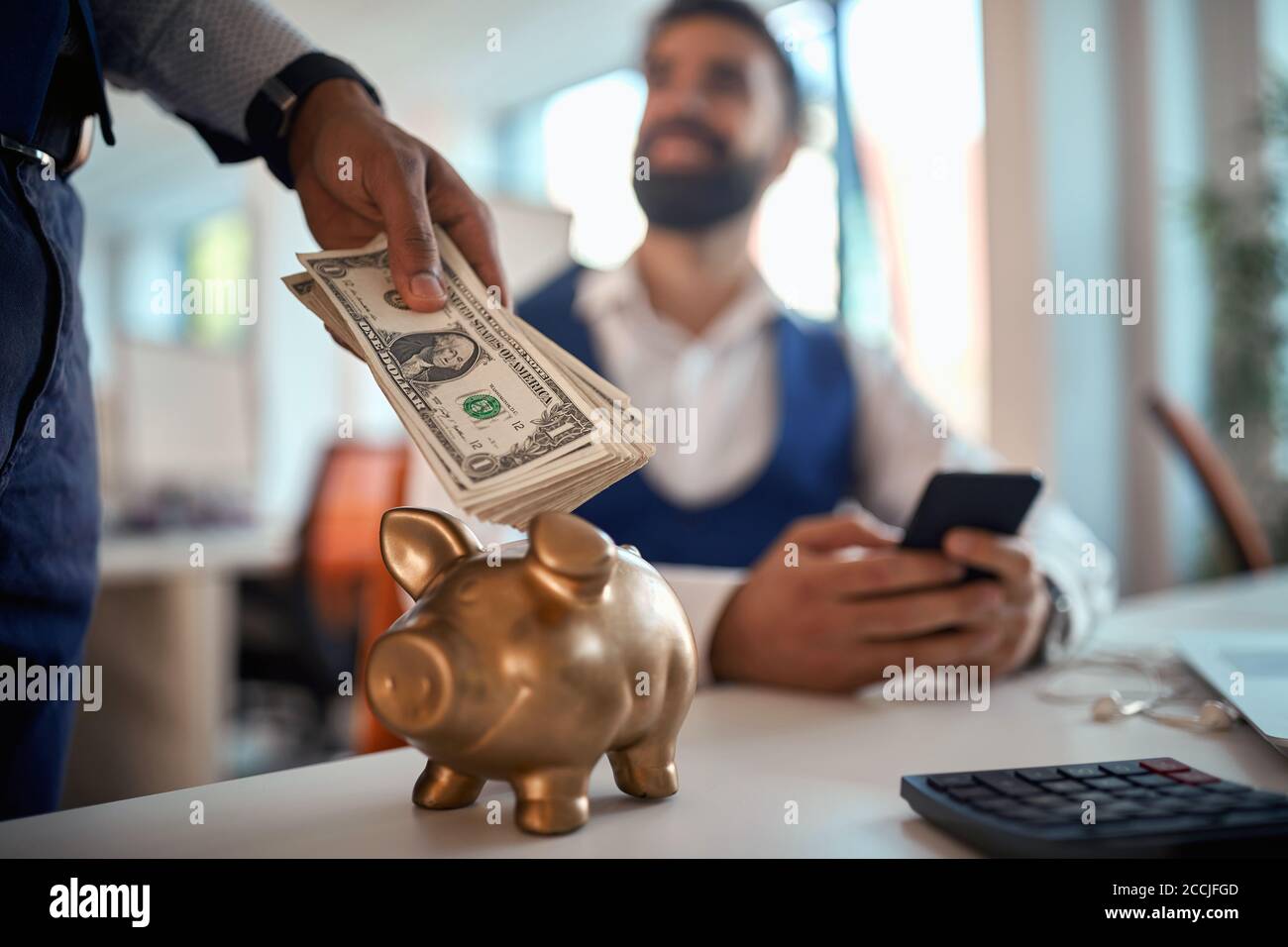Employee in bank hi-res stock photography and images - Alamy