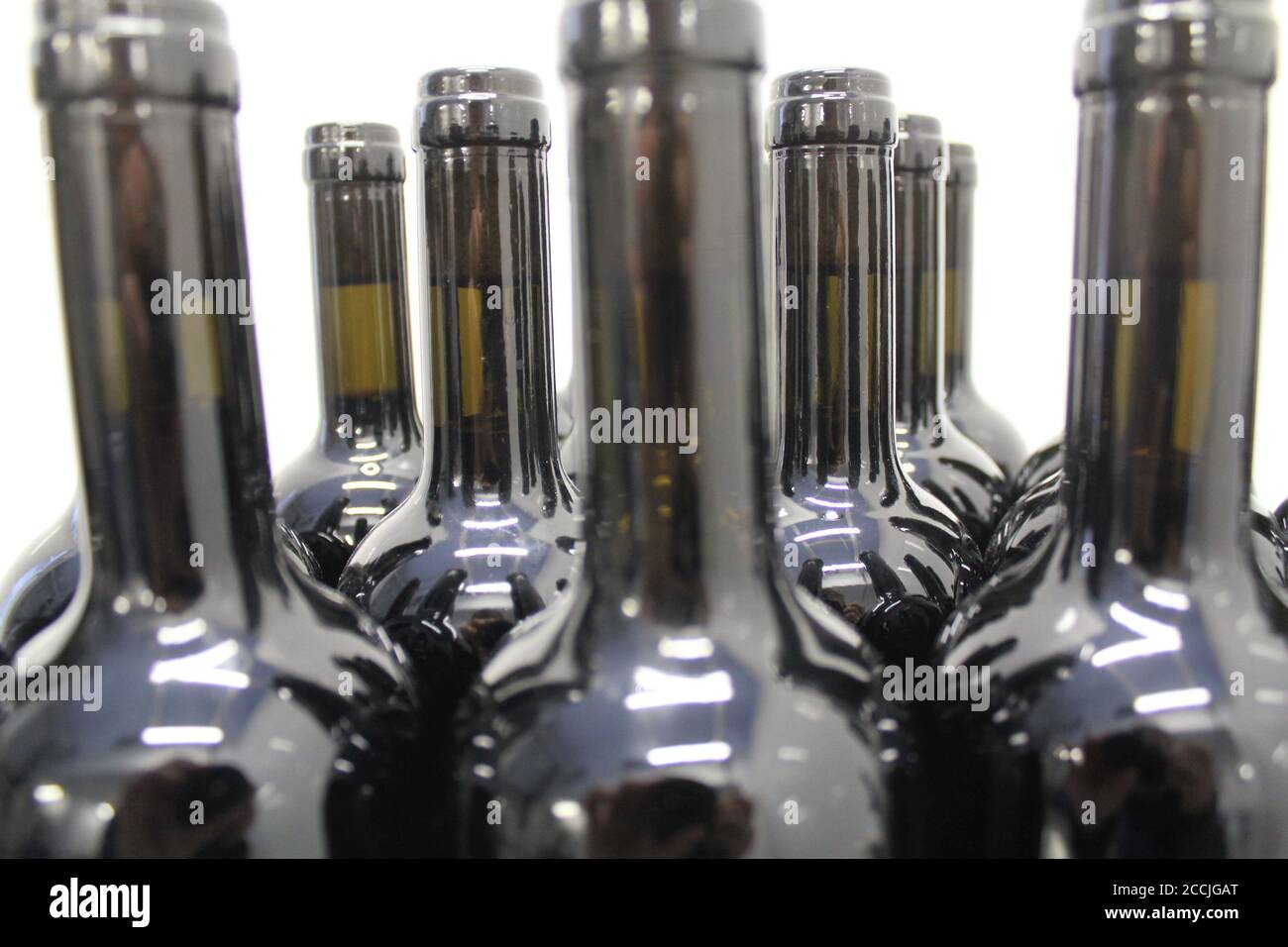 Glass bottles stacked in a wine factory Stock Photo - Alamy