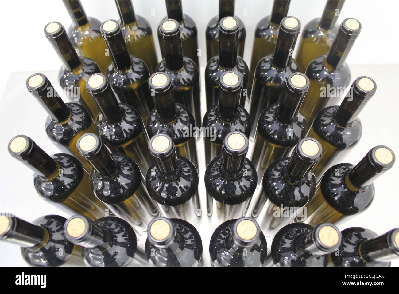 Glass bottles stacked in a wine factory Stock Photo - Alamy