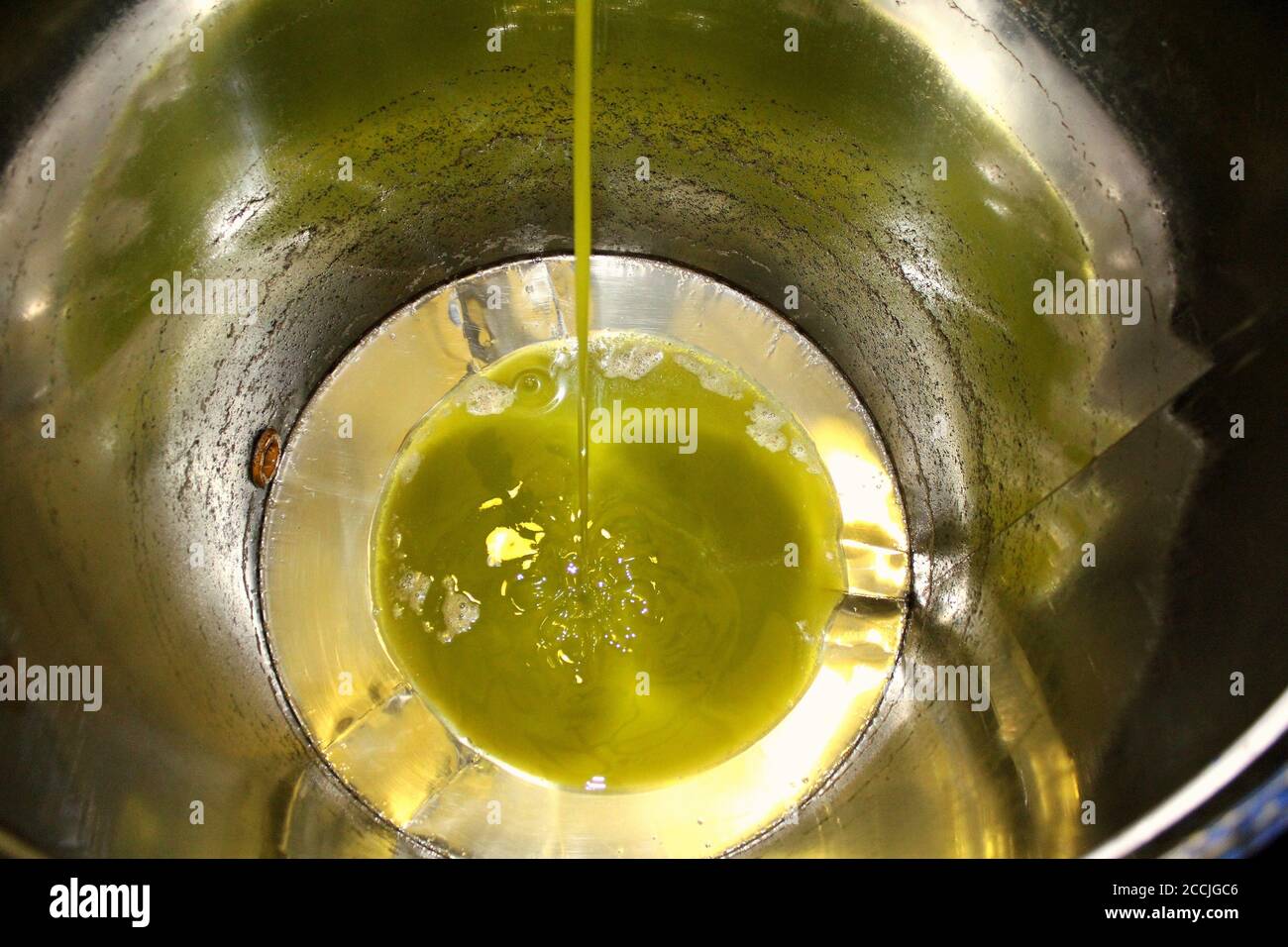 Greece, Attica, extra virgin olive oil extraction process in olive oil ...