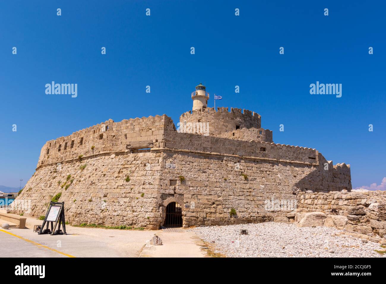 The fort of St. Nicholas in Mandrakia port of Rhodes. Greece Stock ...