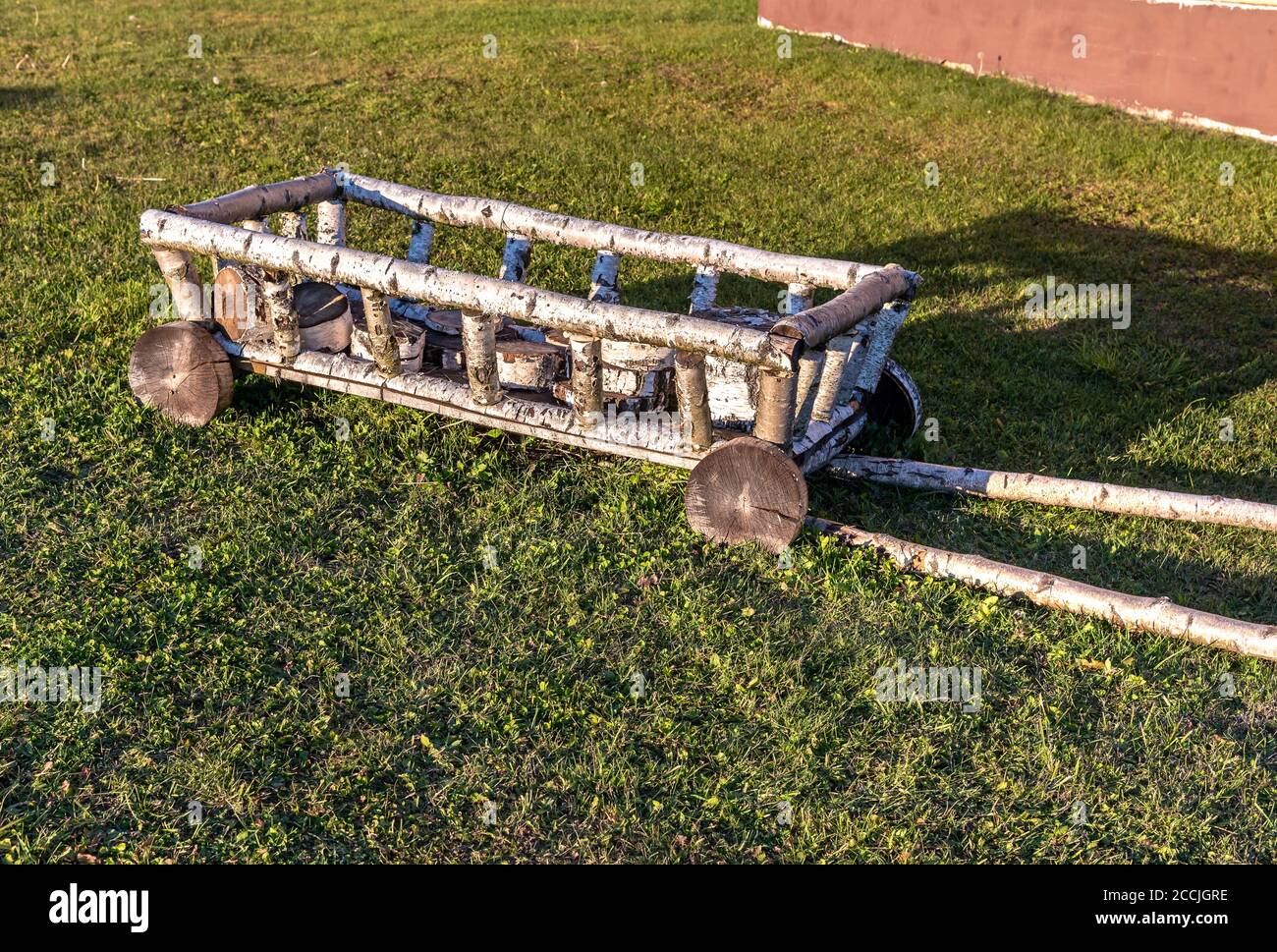 Wooden wheel barrow hi-res stock photography and images - Alamy