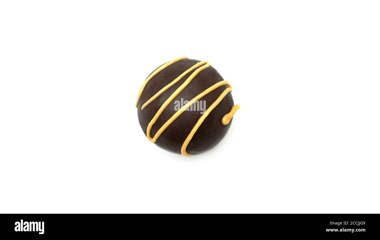 Delicious, round, chocolate candy with nuts on a white background Stock ...