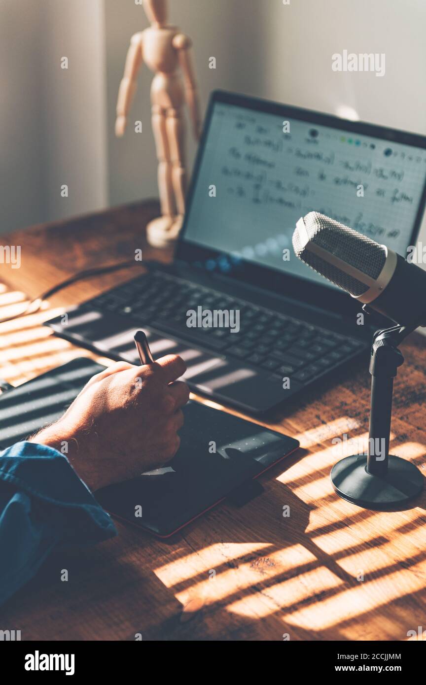Professor is doing online lecture Stock Photo - Alamy