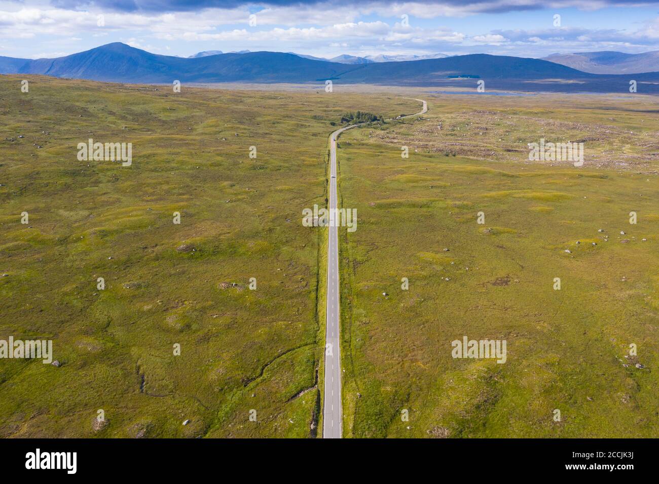Aerial view of A82 road crossing Rannoch Moor in summer, Scotland, UK ...