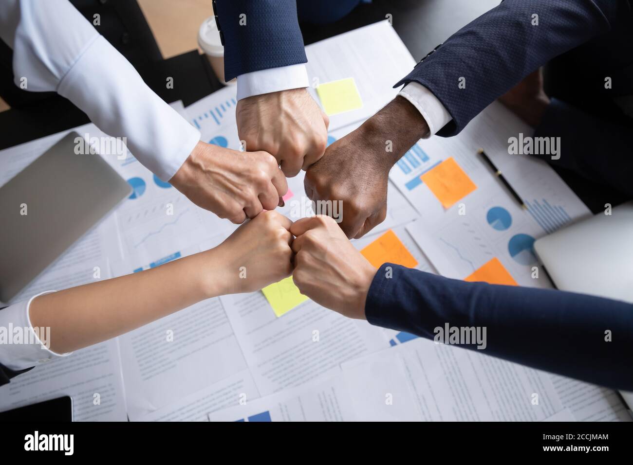 Group of diverse businesspeople teammates demonstrating partnership ...