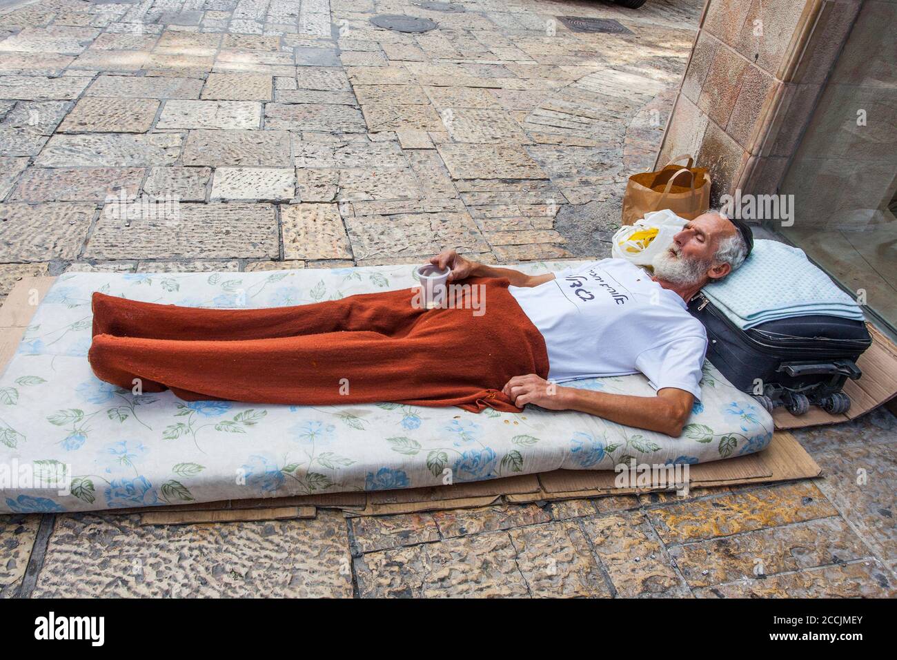 Jerusalem israel sleeping in street hi-res stock photography and images ...