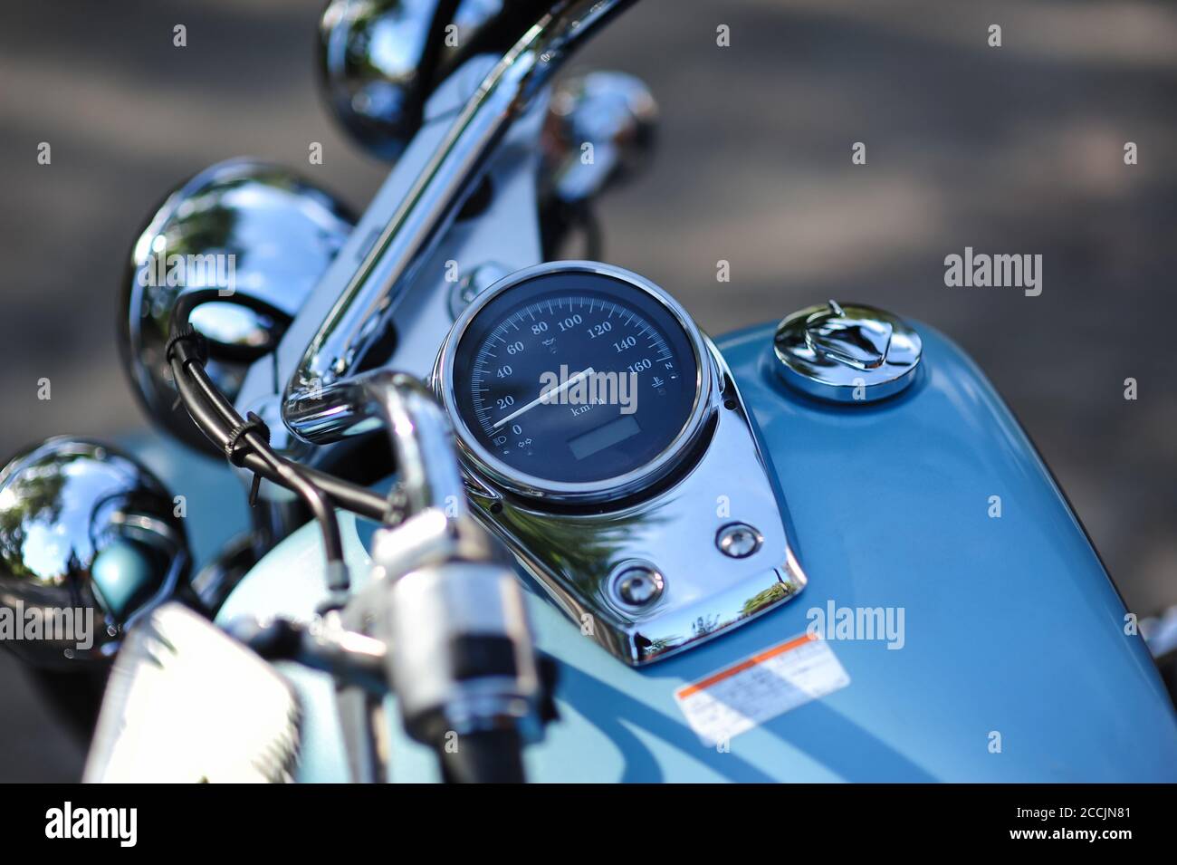 Motorcycle detail with gasoline tank and speedometer. Chrome motorcycle ...