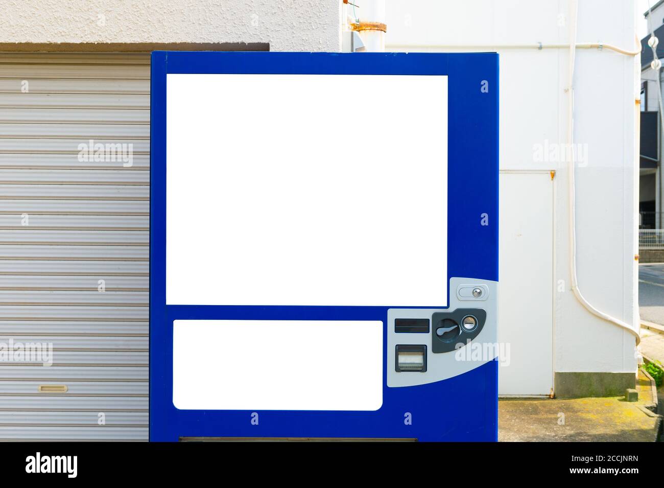 Empty white shelves of standard office vending machine Stock Photo - Alamy