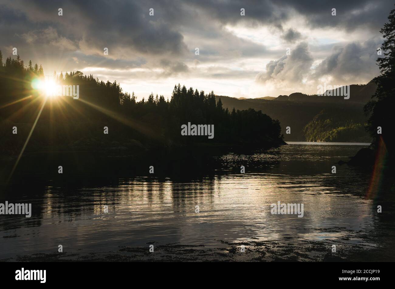 Midnight sun in midsummer by the fjord hi-res stock photography and ...