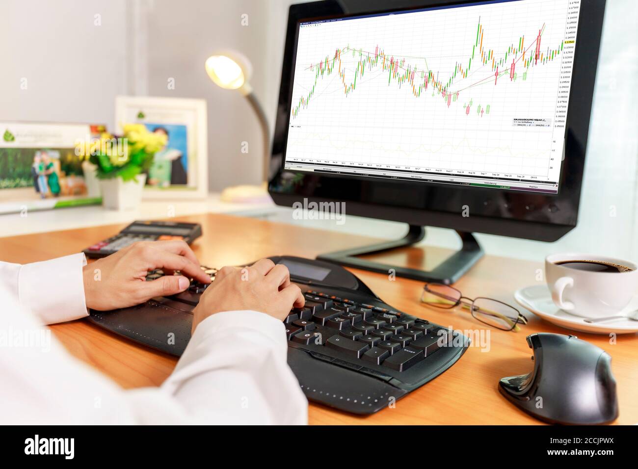 Business and financial concept Hands of business women use PC computer ...