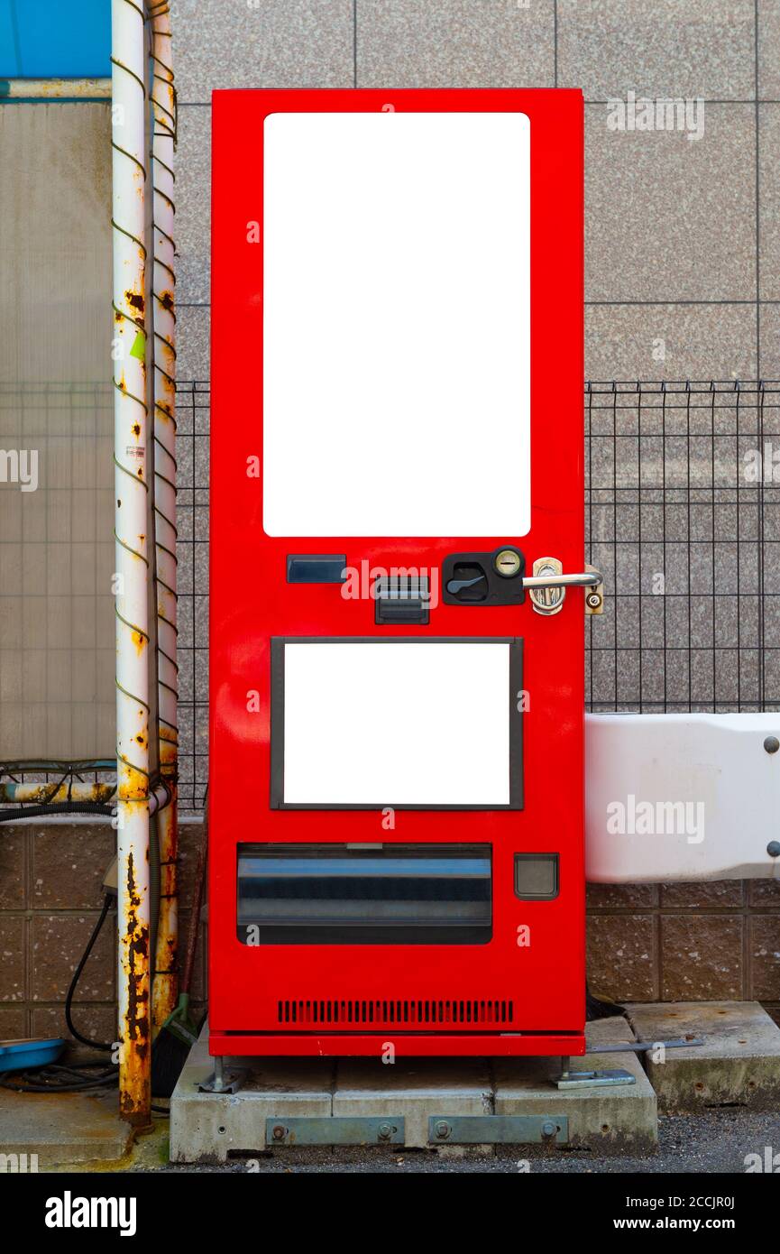 Empty white shelves of standard office vending machine Stock Photo - Alamy