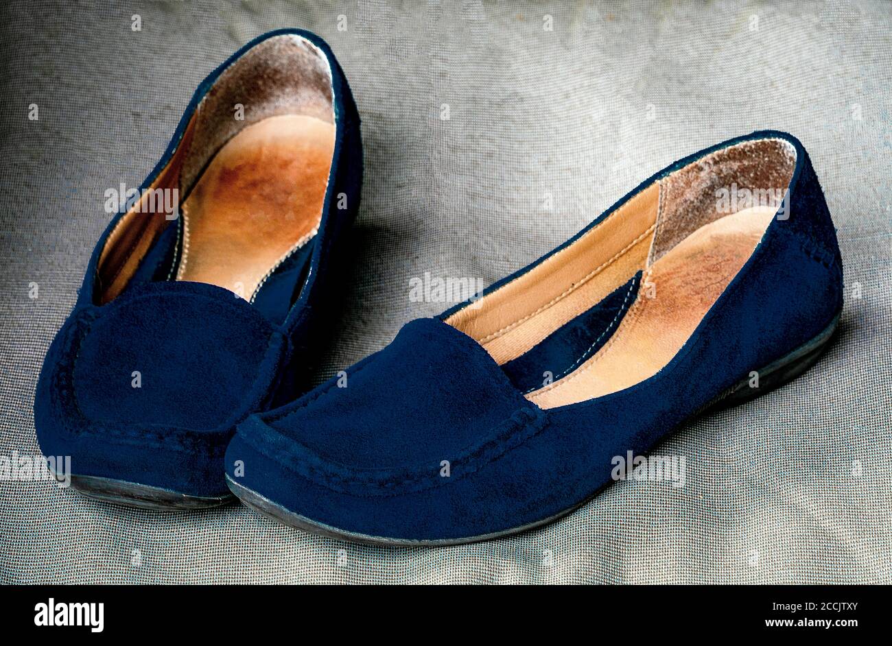 Dark blue suede female slippers Stock Photo - Alamy