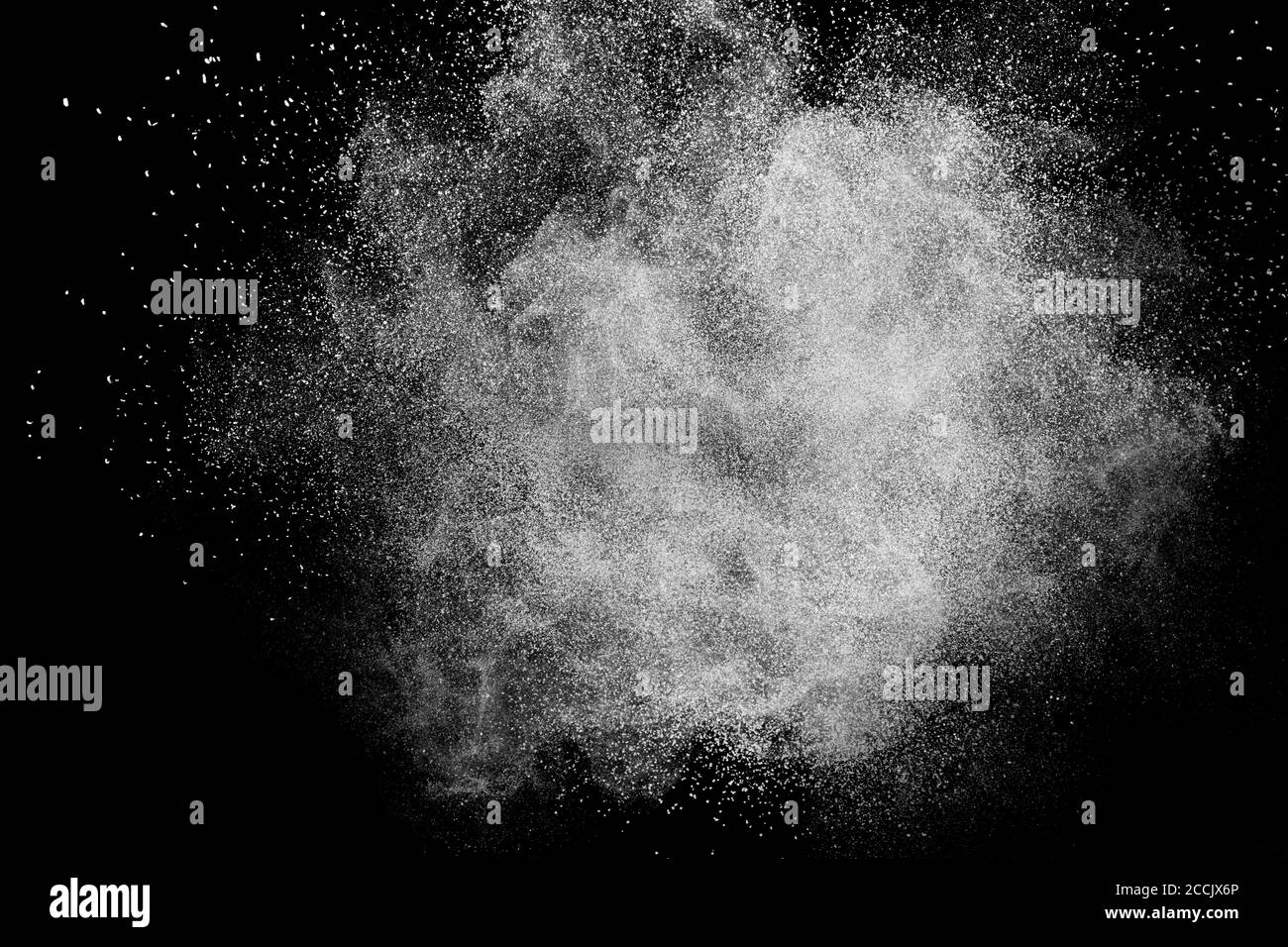 White powder dust particles explosion on a black background Stock Photo ...