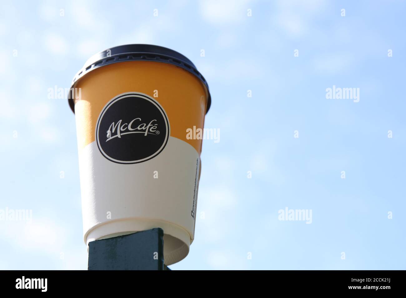 McDonald's McCafe disposable coffee beverage cup on blue sky background ...